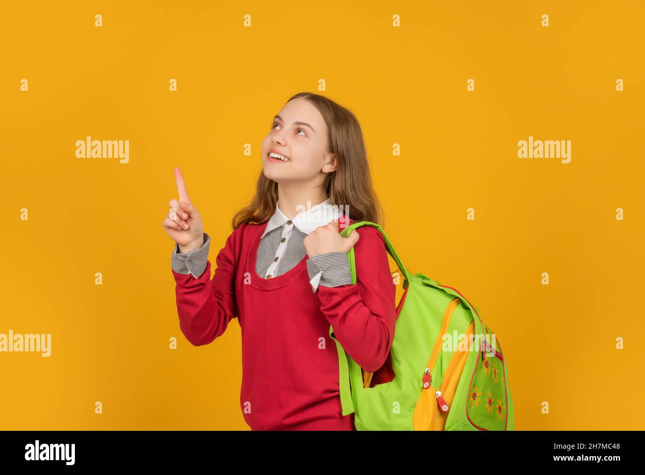 concept of education. kid on yellow background. september 1. happy ...