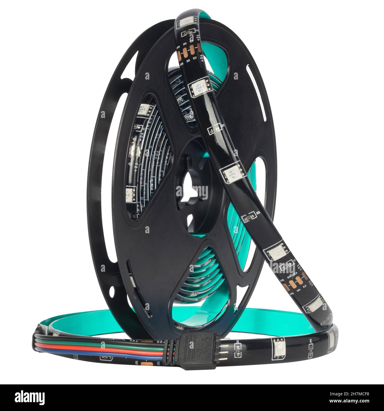 Closeup image of LED RGB tape twisted around plastic bobbin isolated at ...