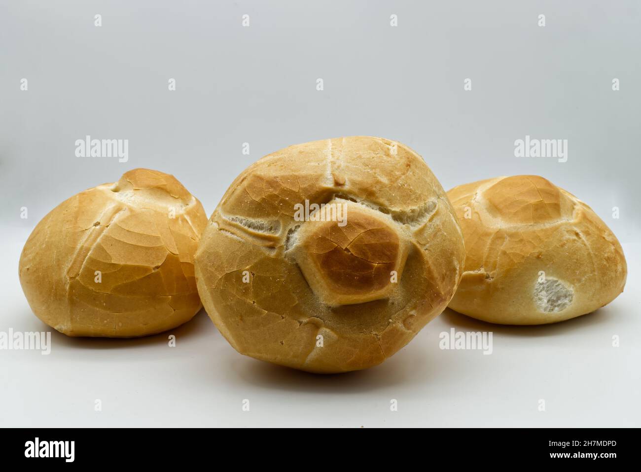 Loaf of Rosetta bread on white background. Michetta, traditional ...