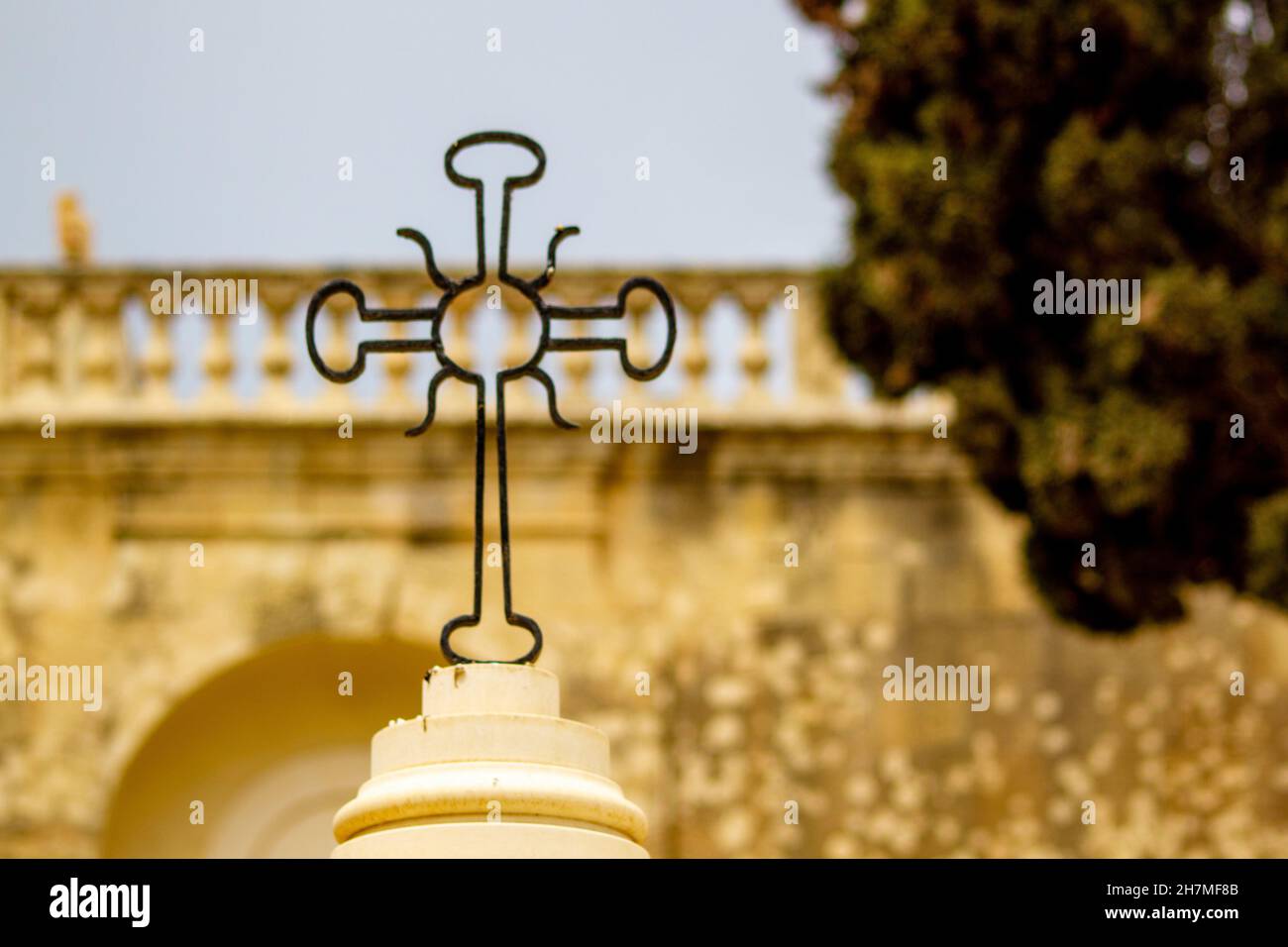 Metal Cross on Stone Pillar Stock Photo - Alamy