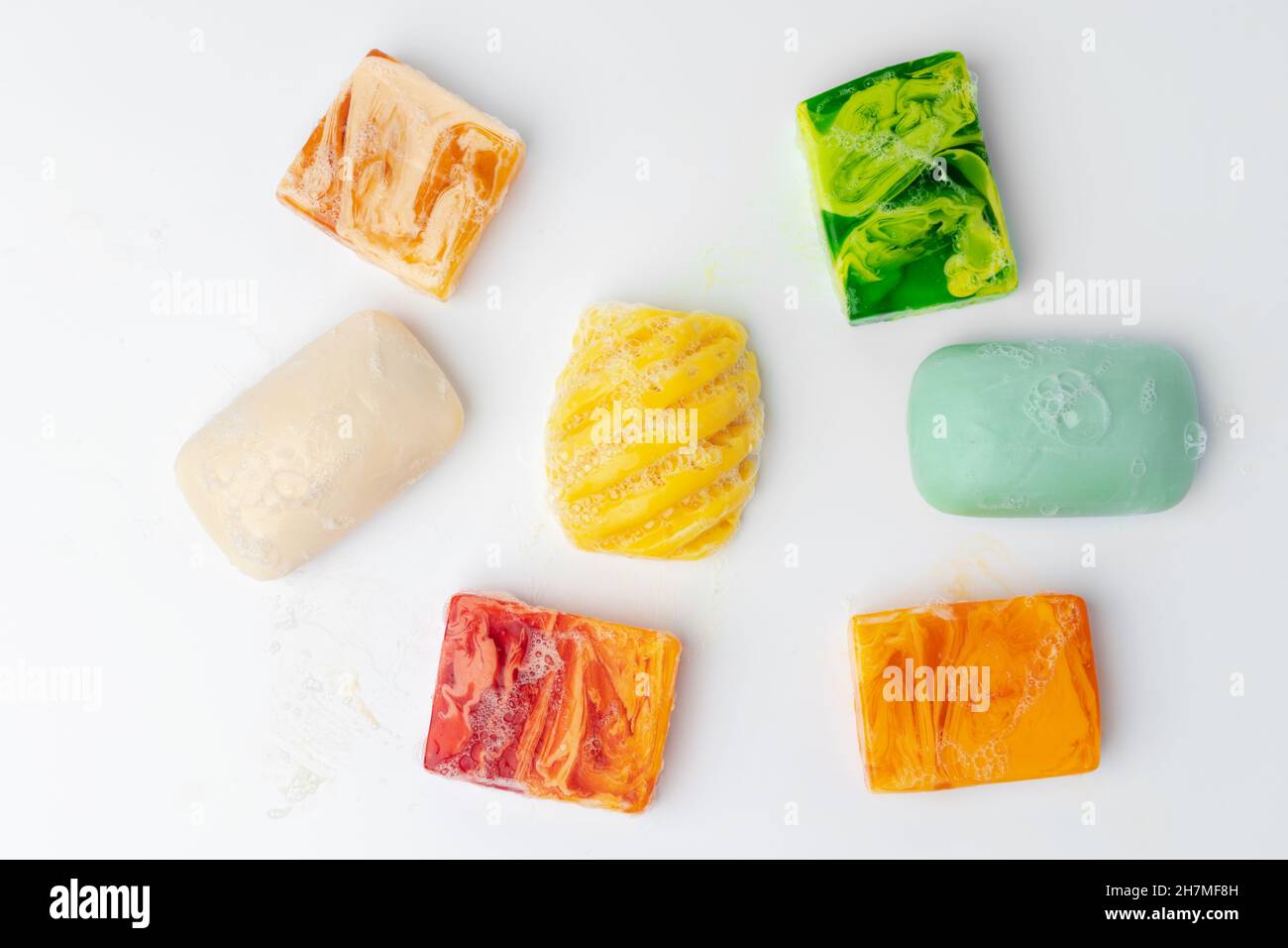 Colorful handmade soap bars on a white background Stock Photo - Alamy