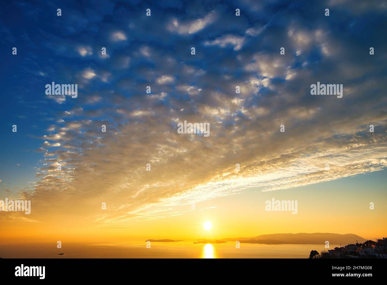 sunset on a greek island. Skopelos island Stock Photo - Alamy