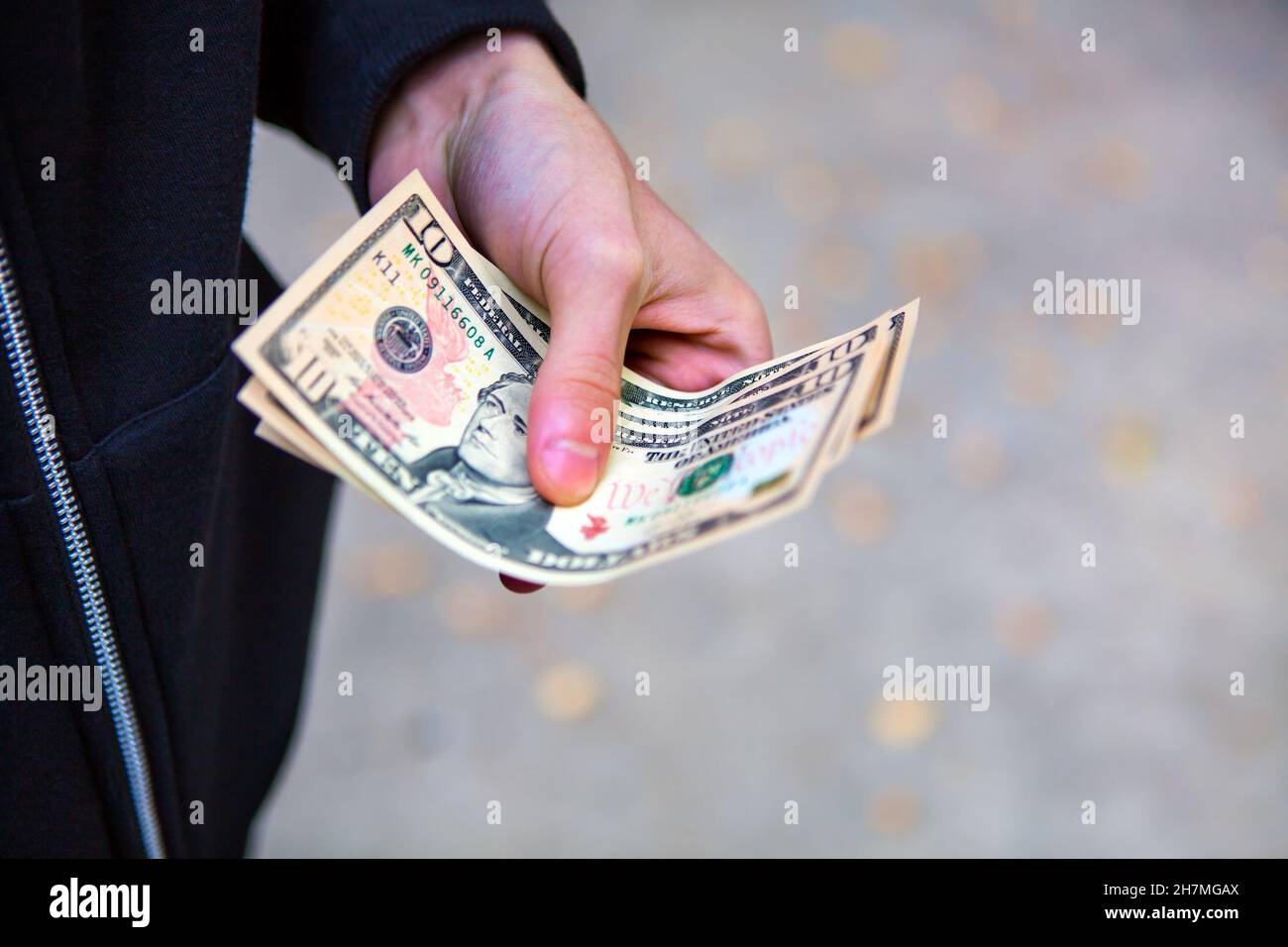 Money on the street hi-res stock photography and images - Alamy