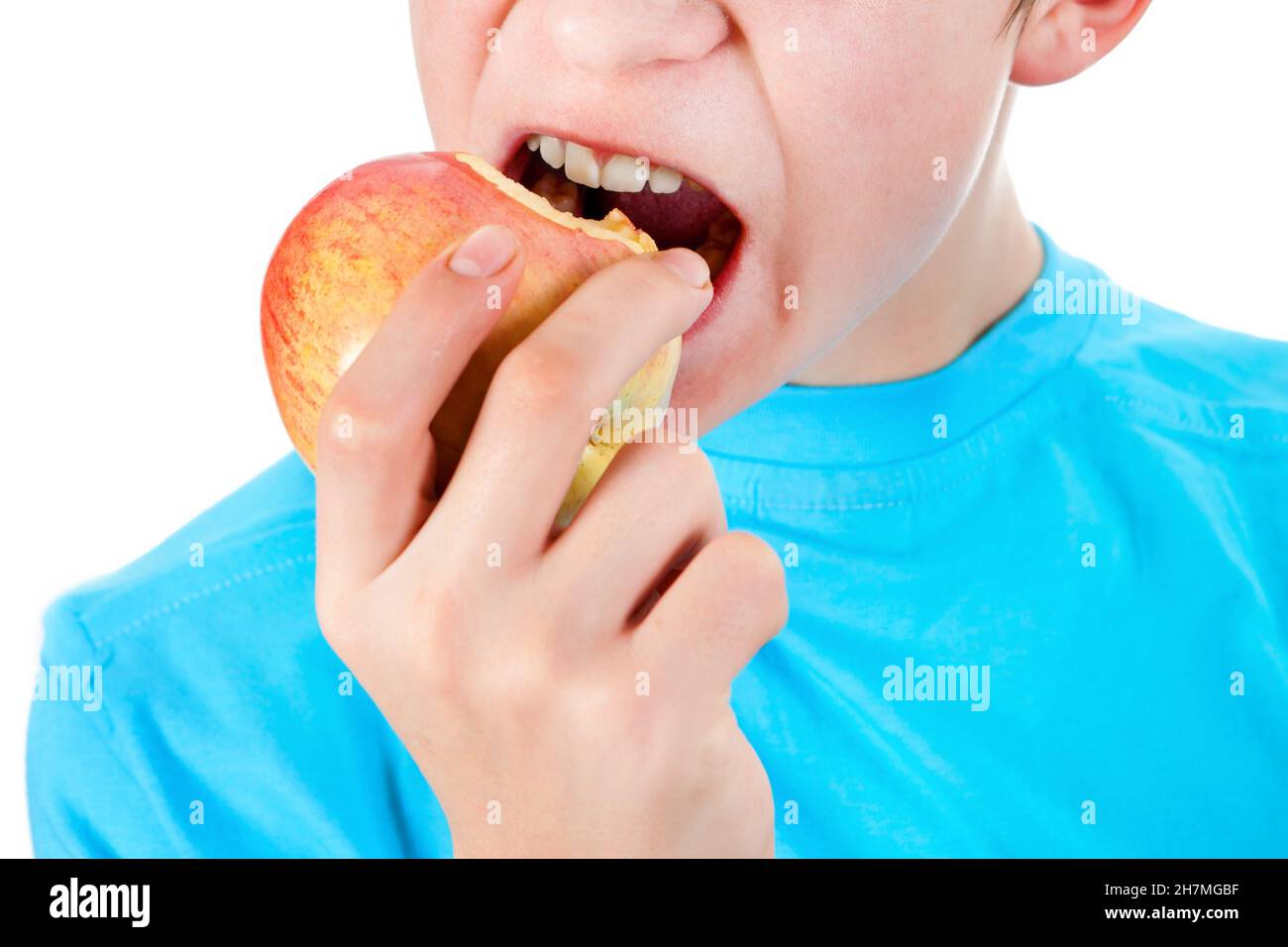 Boy eat apple on white hi-res stock photography and images - Alamy