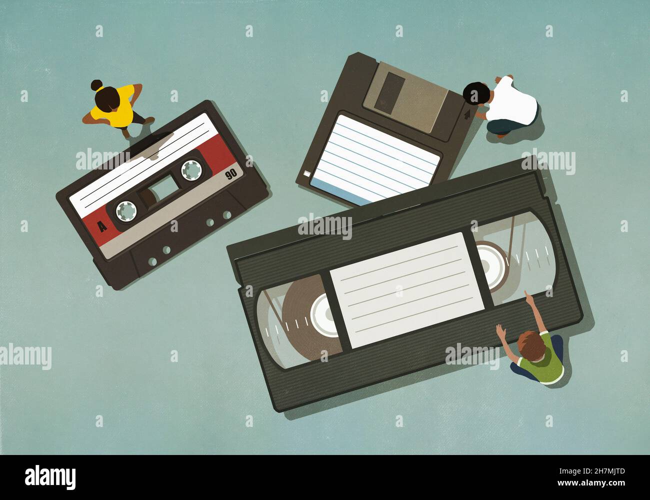 People looking at antiquated cassette and VHS tapes Stock Photo - Alamy