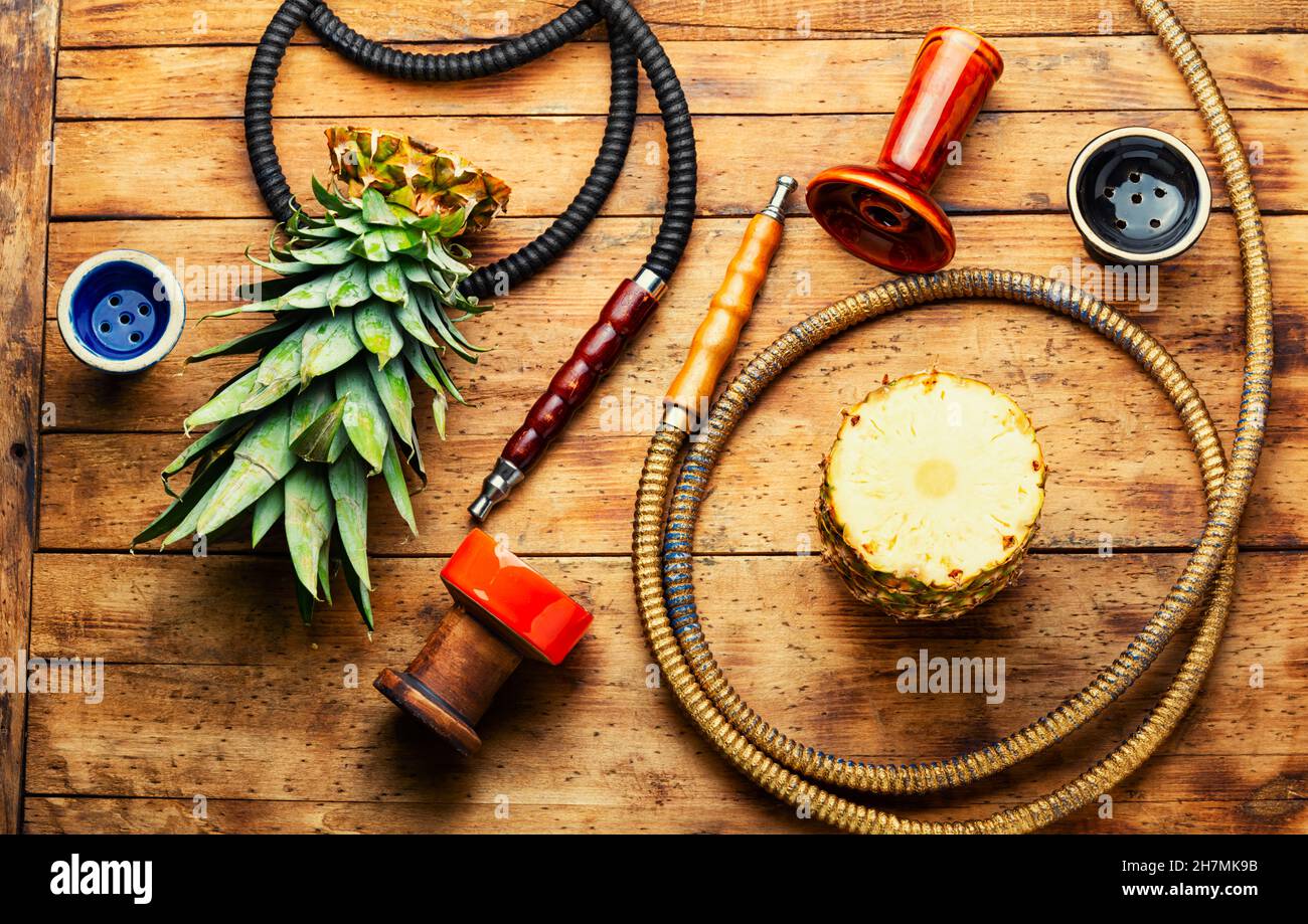 Oriental hookah shisha with fresh pineapple flavor. Hookah smoking ...