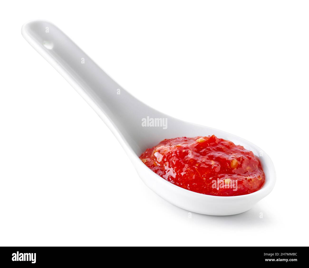 spoon of red hot chili pepper sauce isolated on white background Stock ...
