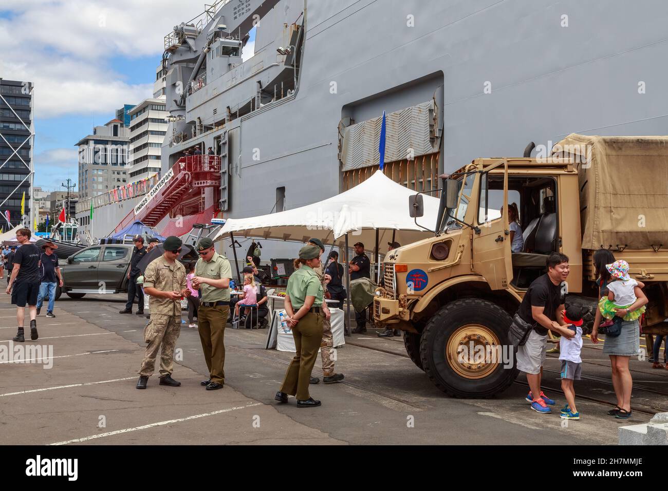 Members of the New Zealand Armed Forces and a Unimog truck at the Port ...
