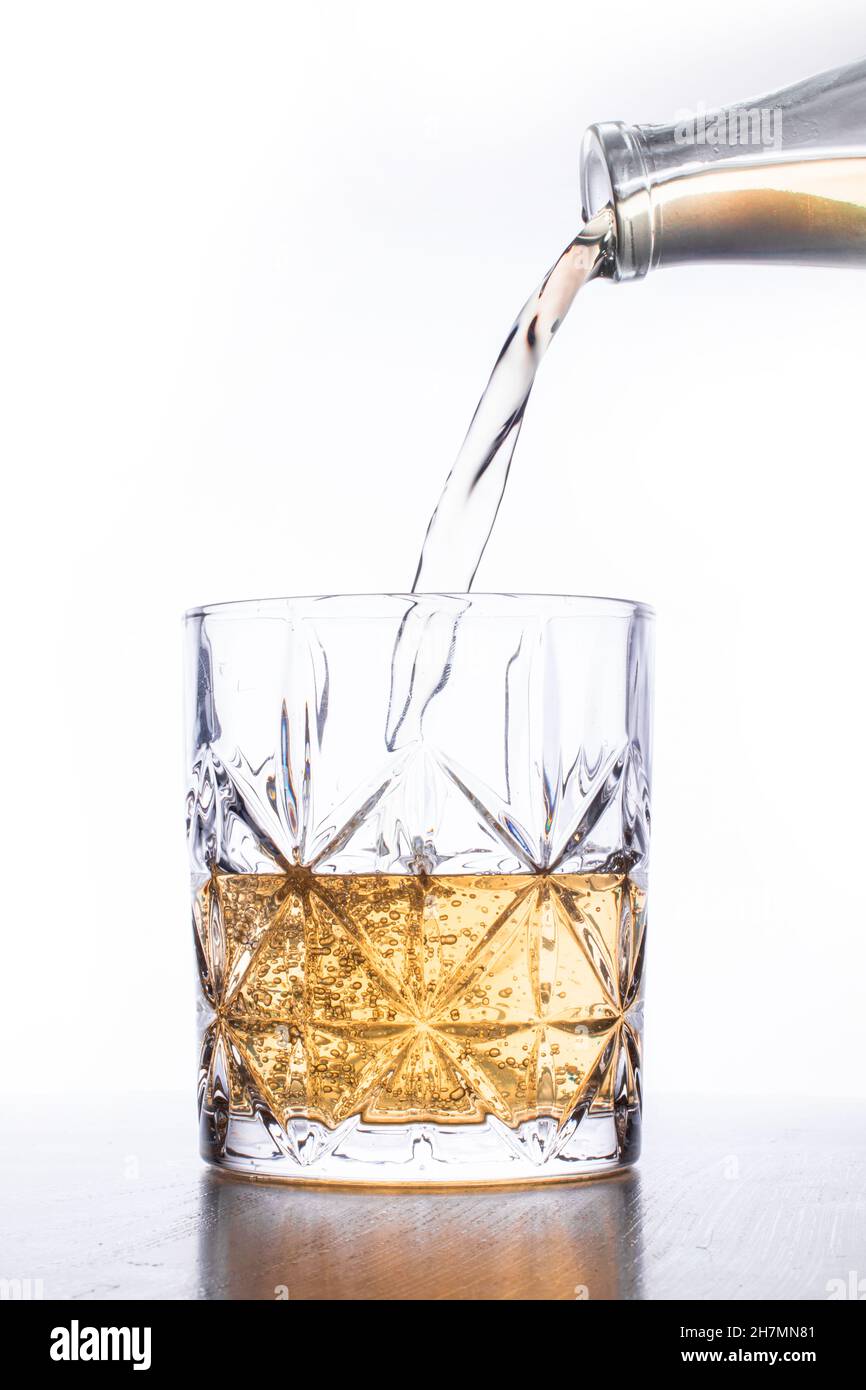 Pouring Whisky Into Glass Stock Photo - Alamy