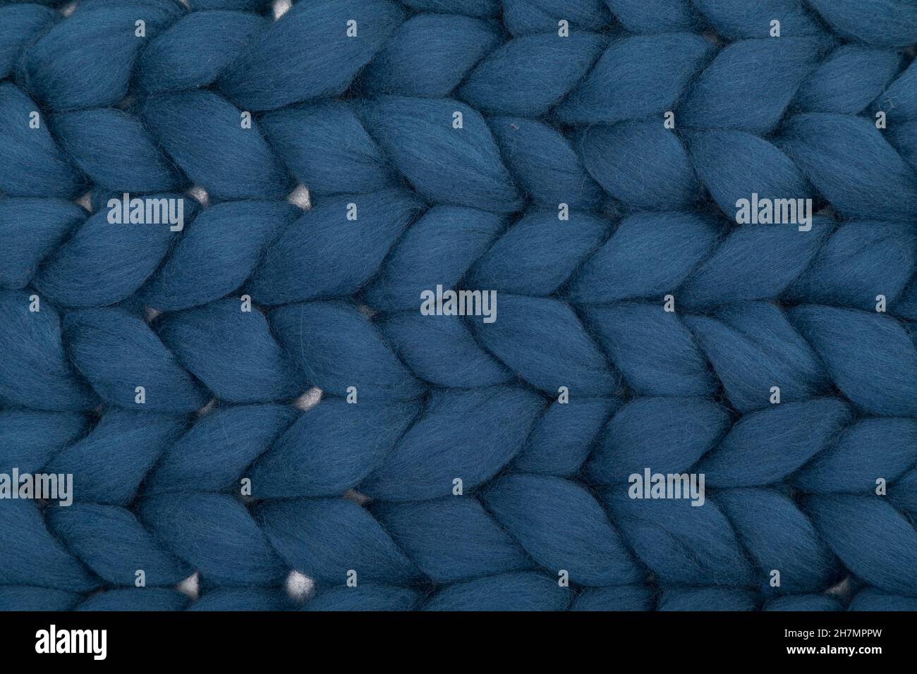 knitted wool from natural materials in blue close-up Stock Photo - Alamy
