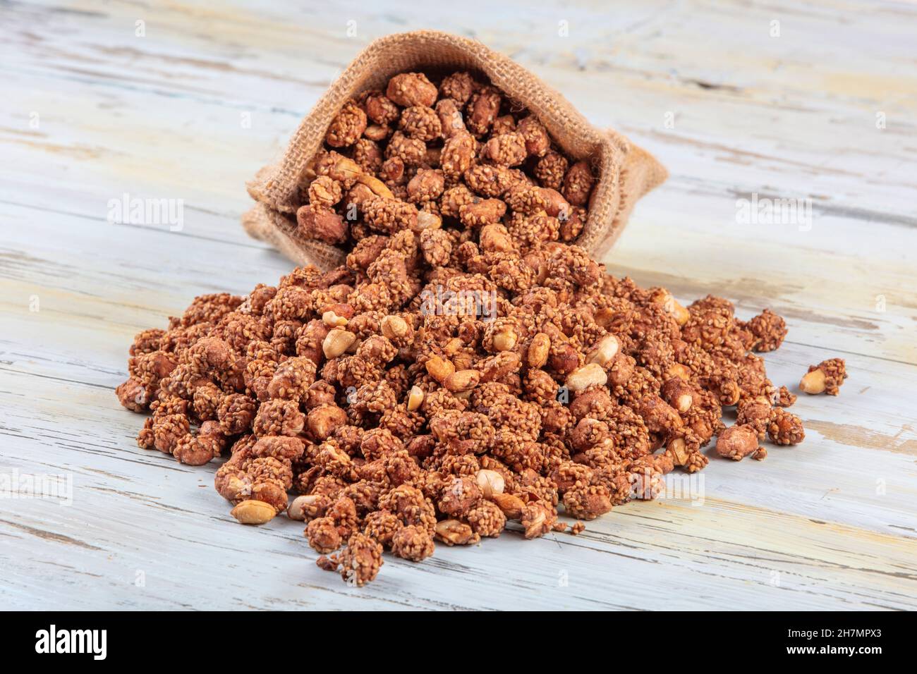 Close-up view of brown colored peanuts and peanut collection. Concept ...