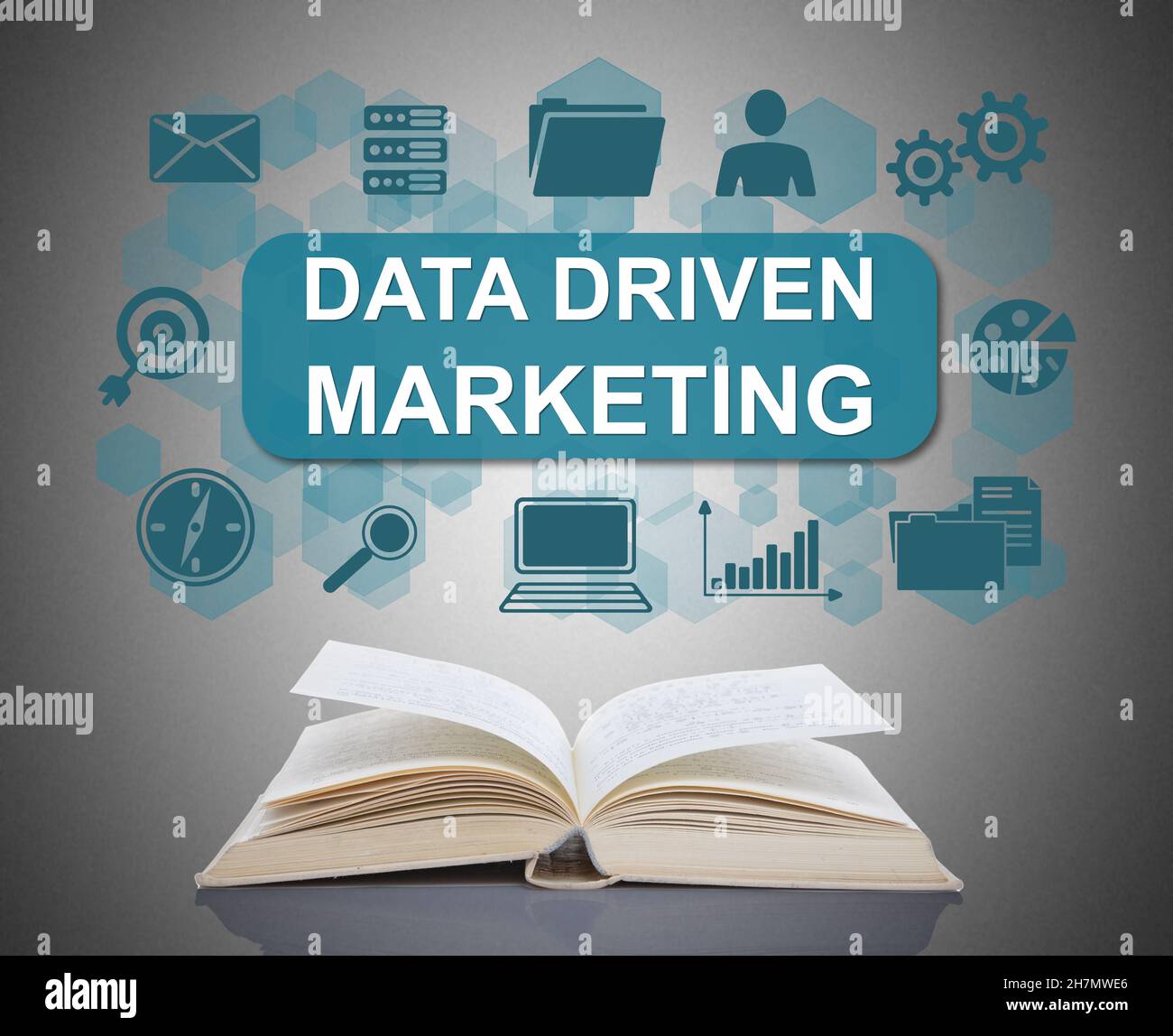 Data driven marketing concept above an open book Stock Photo - Alamy