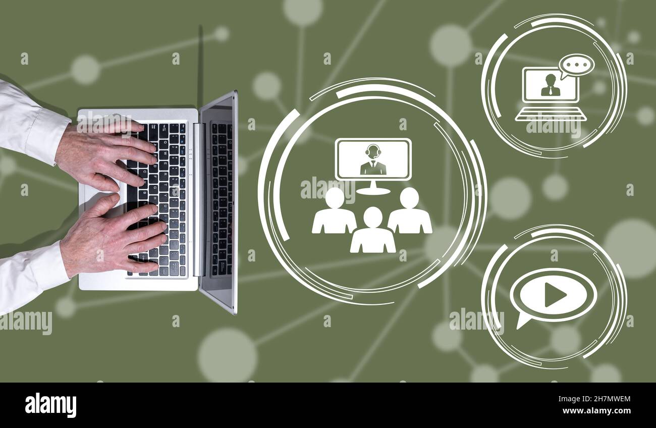 Top view of hands using laptop with symbol of video conference concept ...