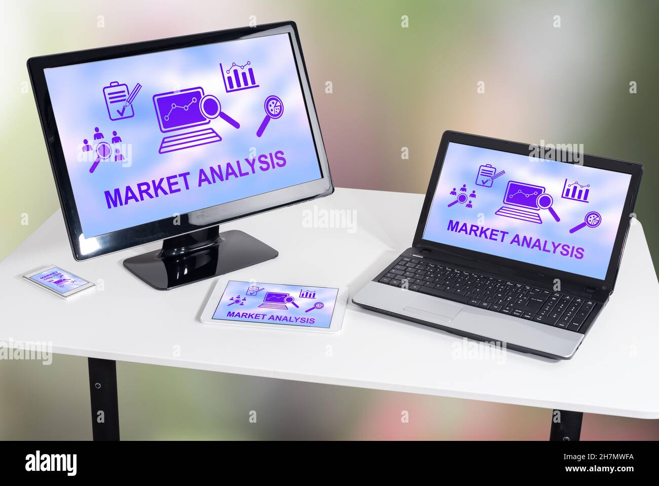Market analysis concept shown on different information technology ...
