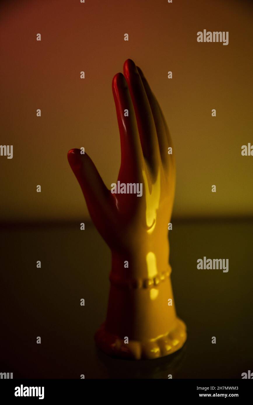 Hand in dimmed light Stock Photo - Alamy
