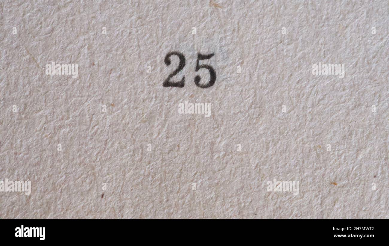 The number 25 printed on a piece of paper. Paper texture Stock Photo ...