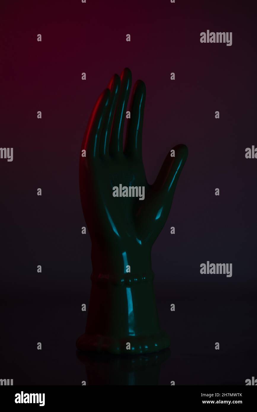 Hand in dimmed light Stock Photo - Alamy