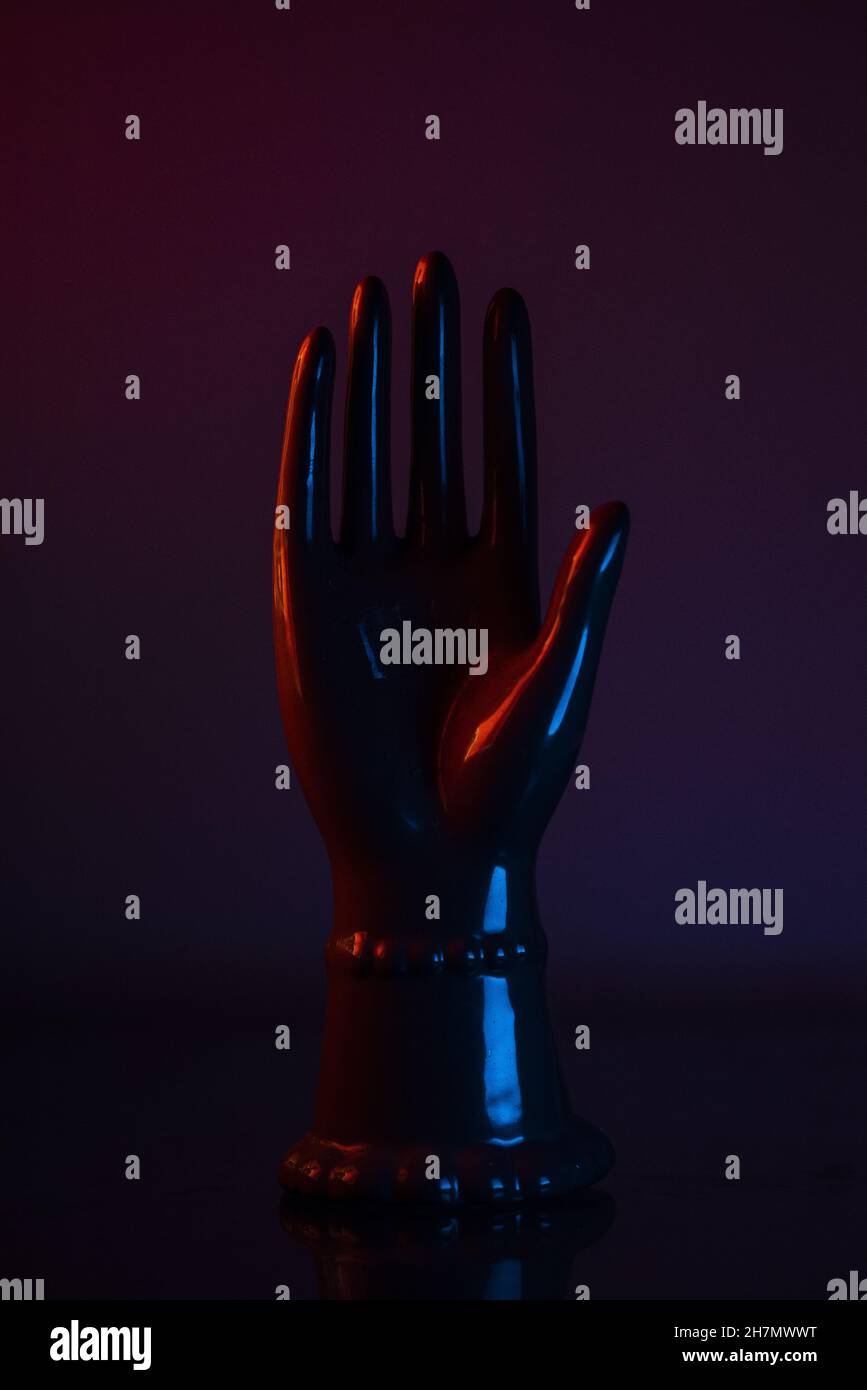 Hand in dimmed light Stock Photo - Alamy