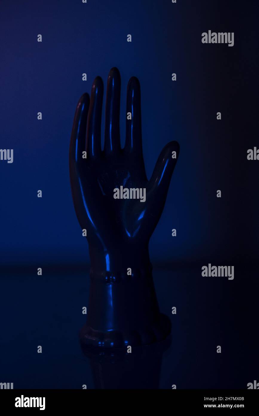 Hand in dimmed light Stock Photo - Alamy