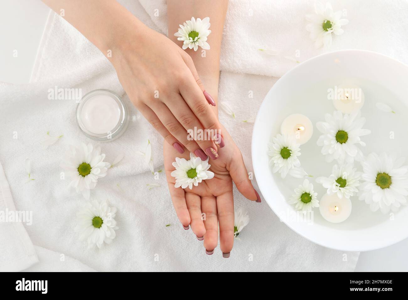 Concept of hand care with cosmetics on white towel background Stock ...