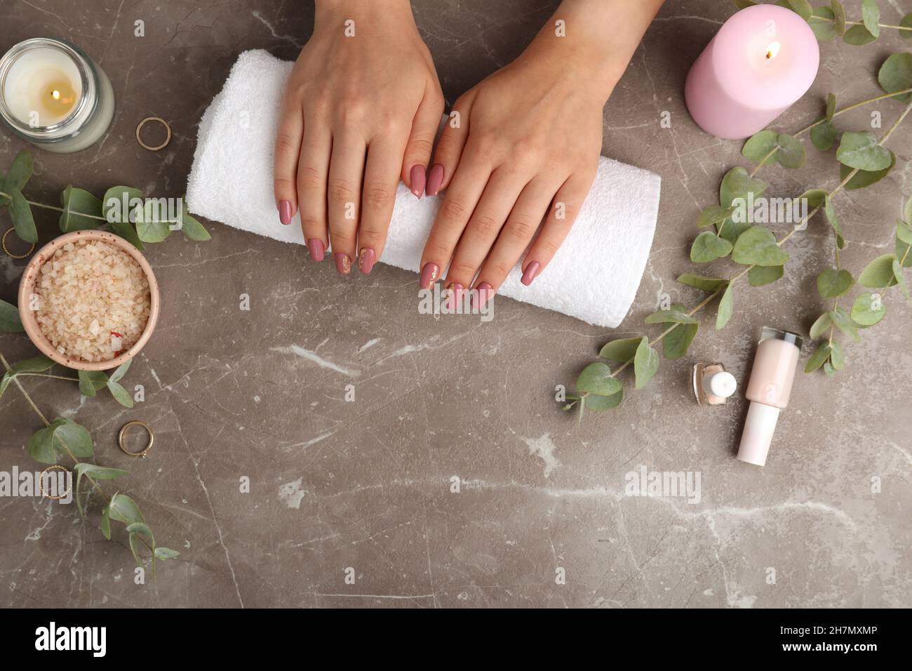 Concept of hand care with cosmetics on gray textured background Stock ...