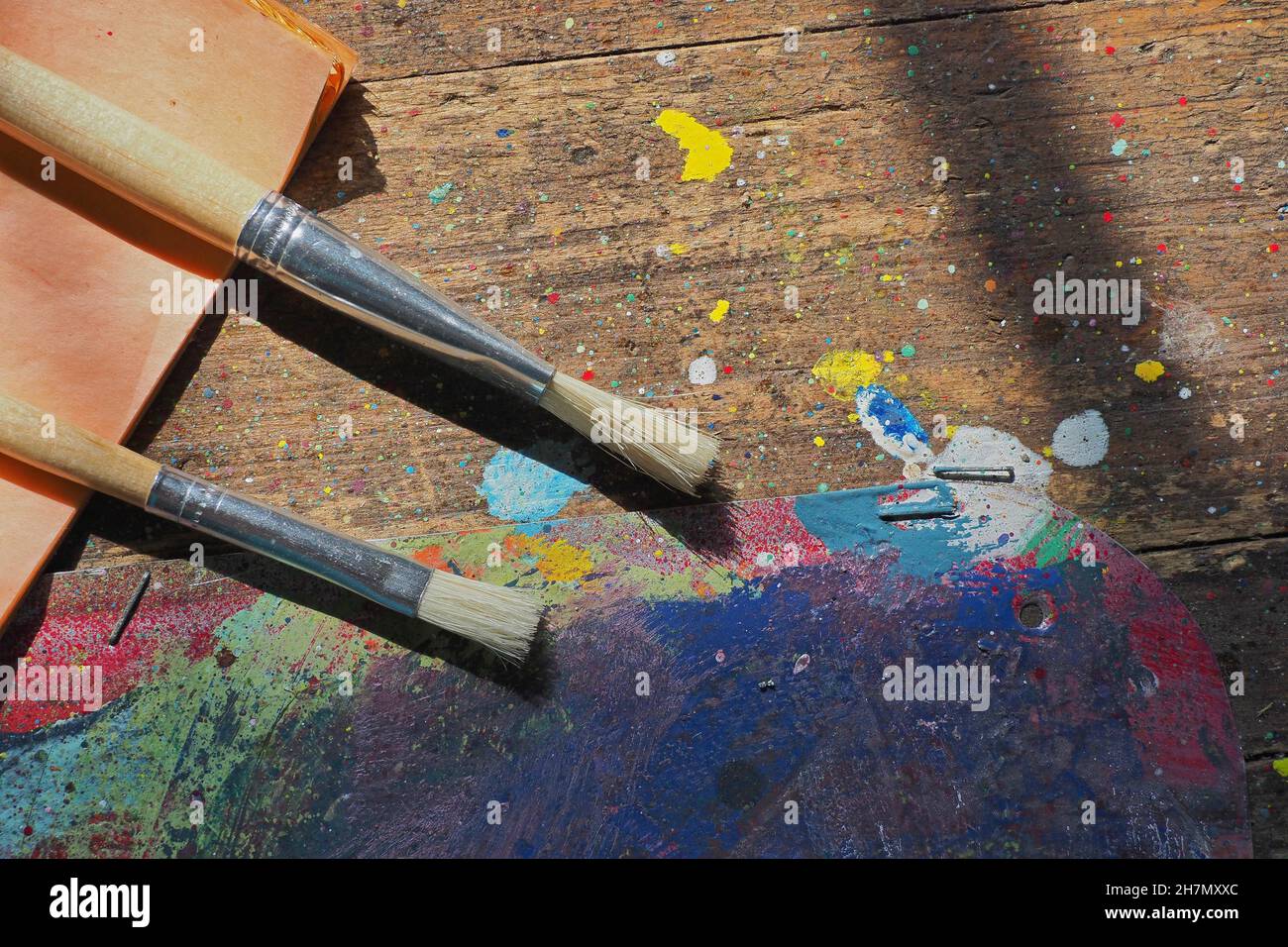 Artist's brush on colour palette, painting tool, paint, colourful ...