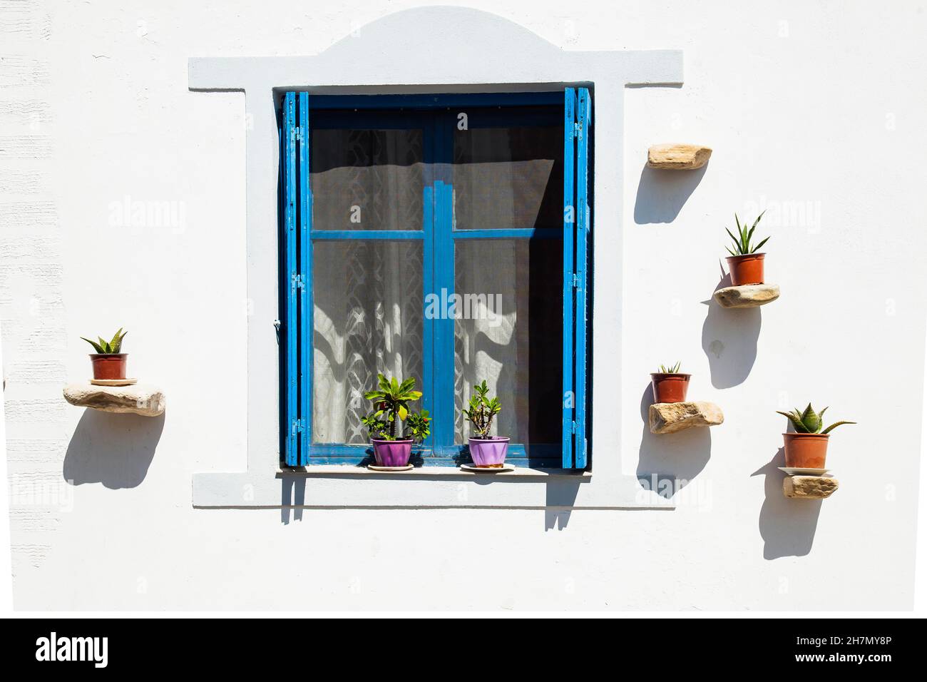 Windows facade detail of a traditional Greek house on Crete, Greece ...