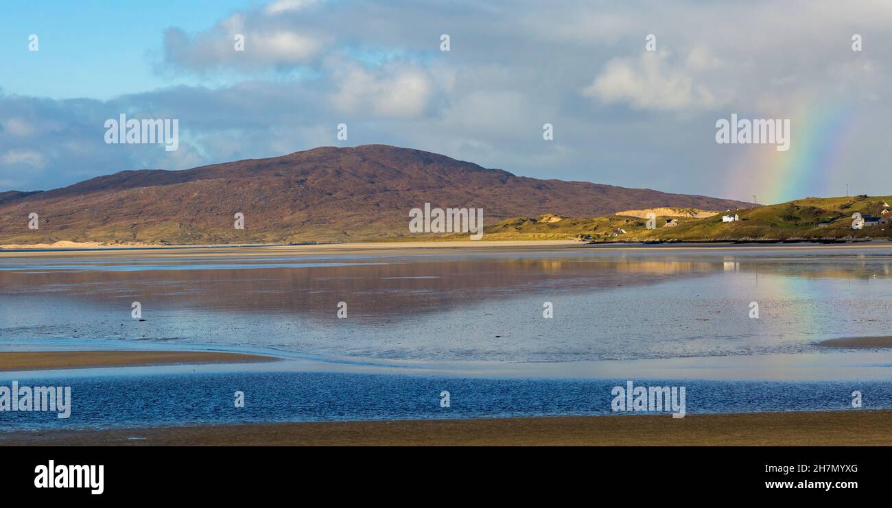Reflected rainbow in inlet between Horgabost beach and Seilebost beach ...