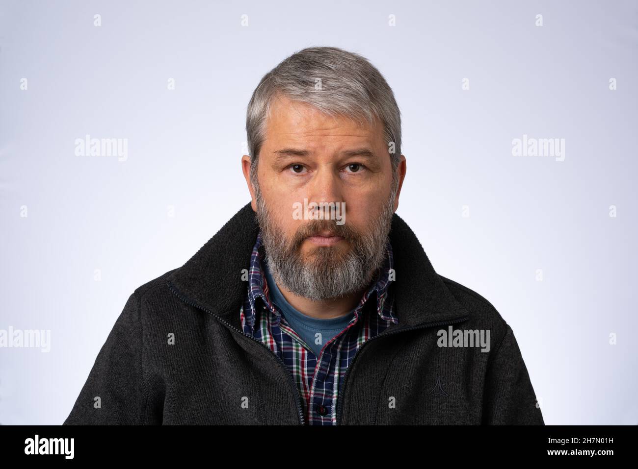 Man with full beard, 54 years, looks attentively into the camera Stock ...