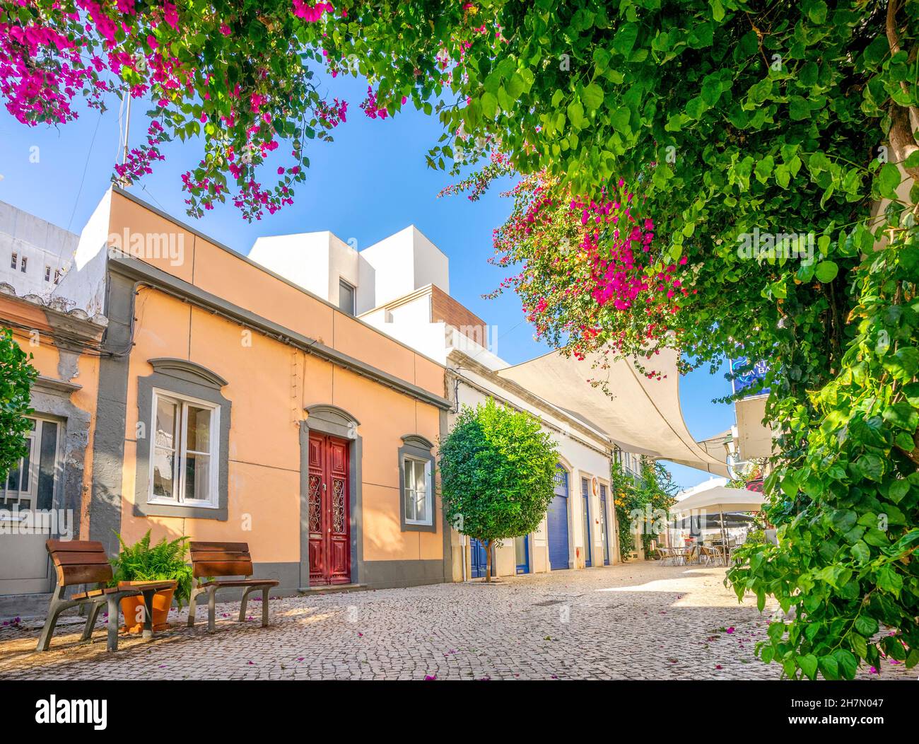 Charming streets with traditional houses in Faro, capital city of ...
