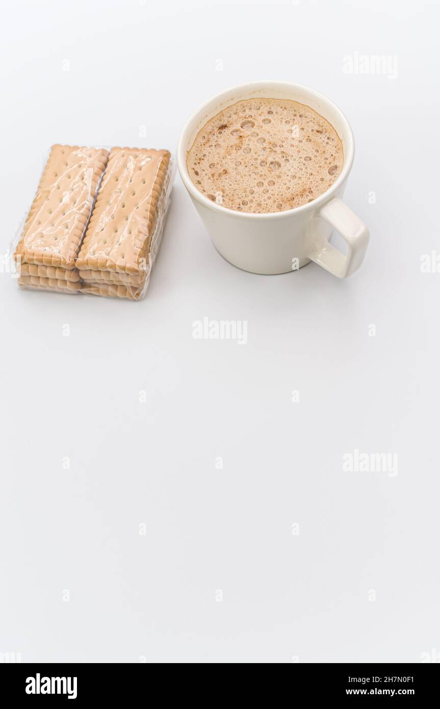 delicious hot vegan Cappuccino with foam in a white cup and packaged ...