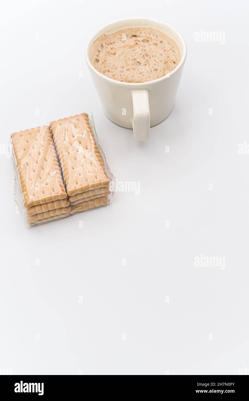 delicious hot vegan Cappuccino with foam in a white cup and packaged ...