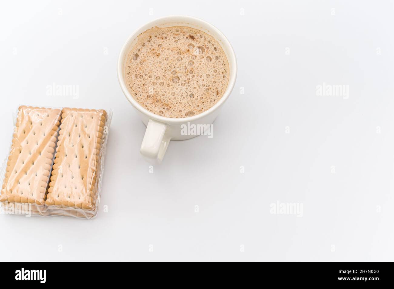 delicious hot vegan Cappuccino with foam in a white cup and packaged ...