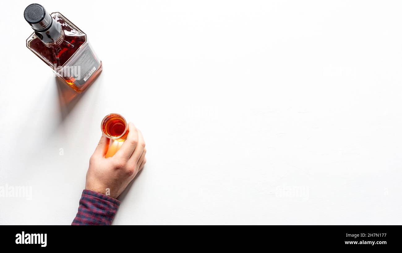 drinks alcohol and bottle of whiskey on white background with place for ...