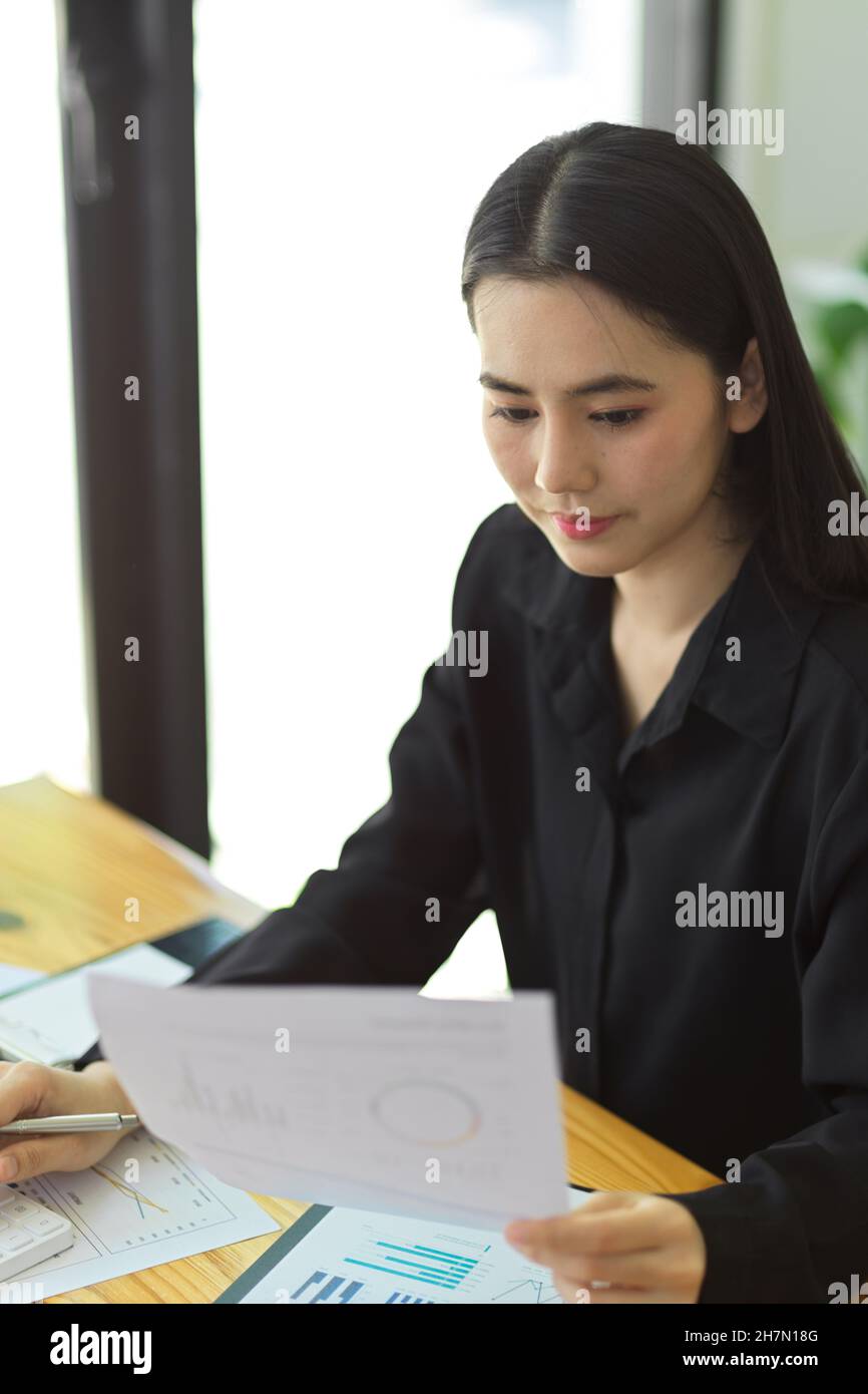 Portrait close-up image of beautiful young businesswoman working and ...