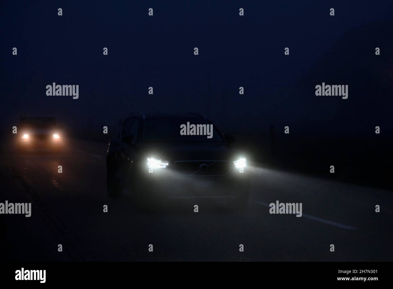 Car by night and fog Stock Photo - Alamy