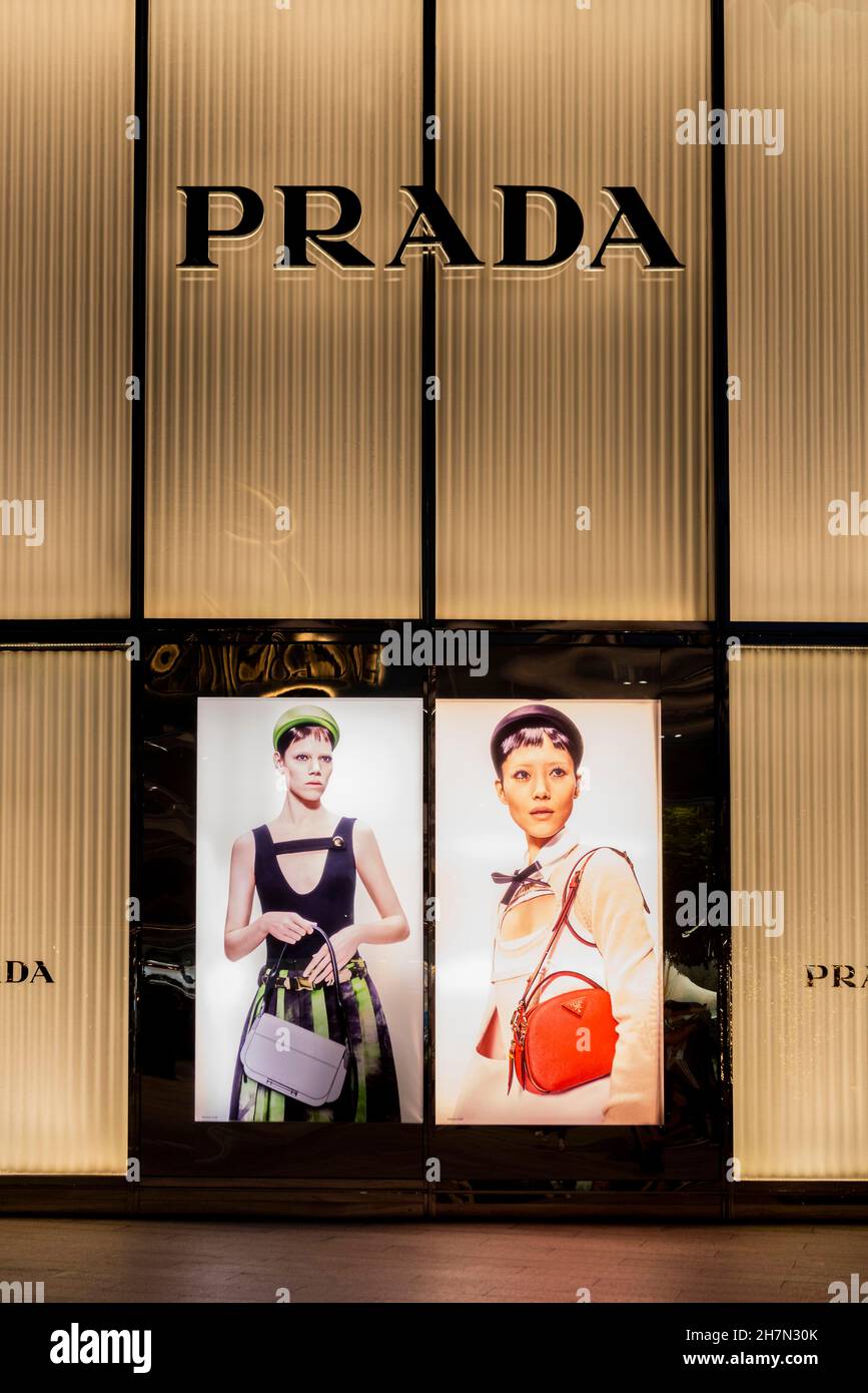 Prada shop window illuminated Stock Photo - Alamy