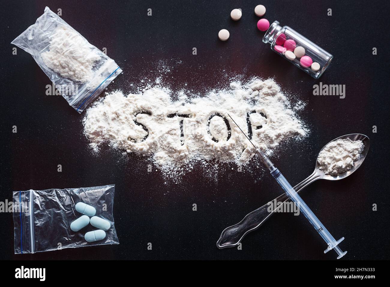 stop drug addiction concept on dark background Stock Photo - Alamy