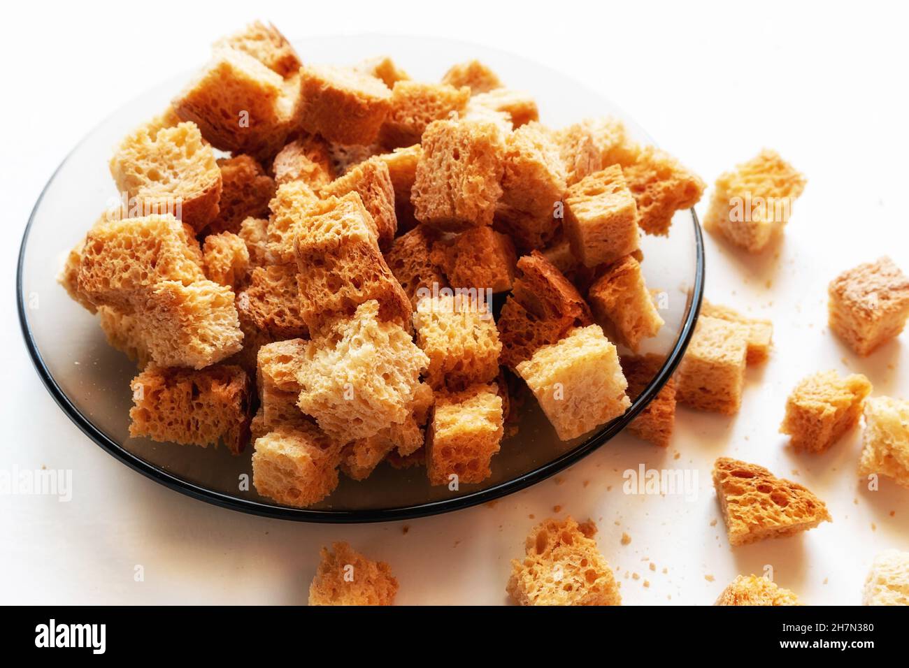homemade rusks croutons of white crispy bread crackers on the plate ...