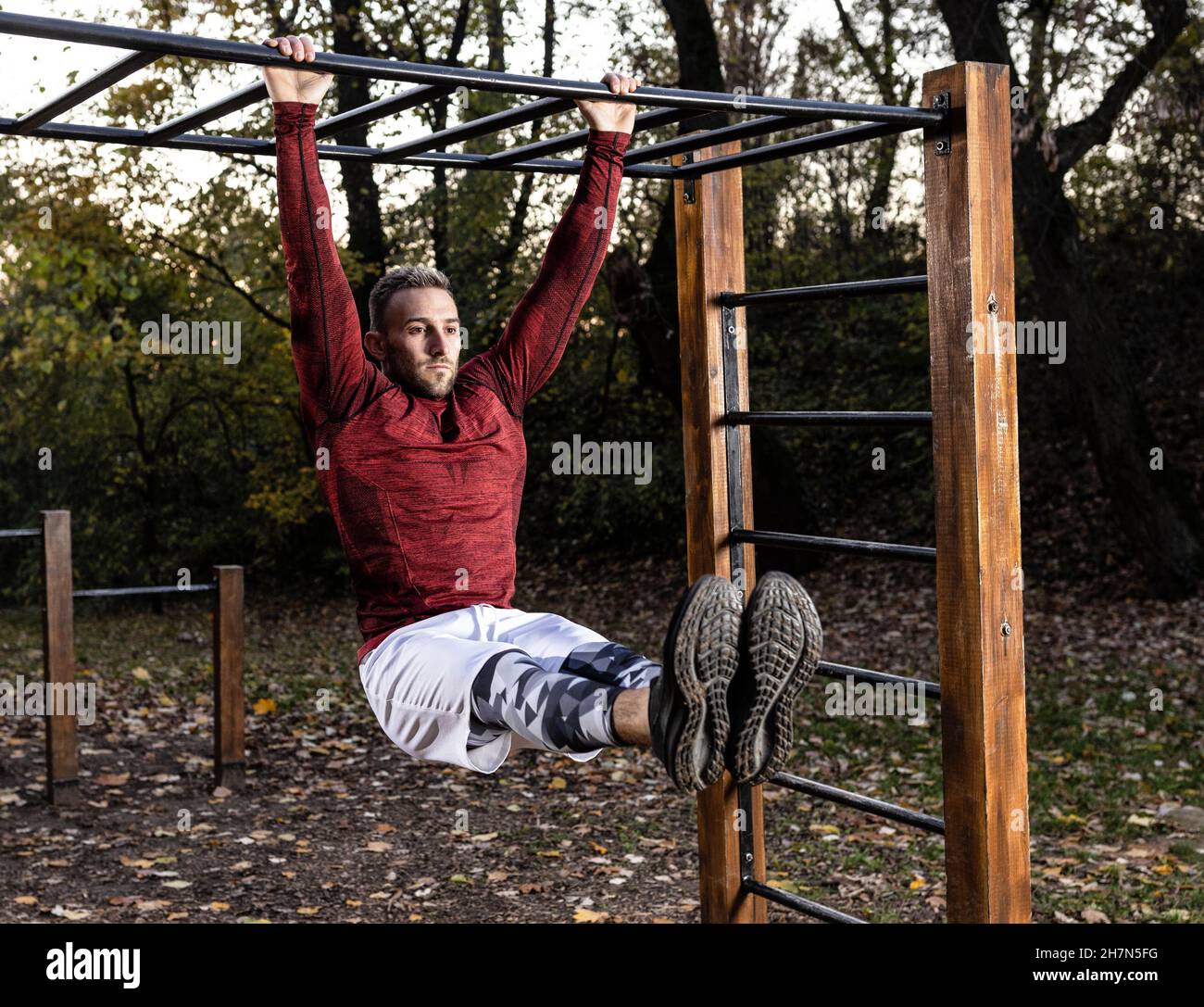 Fitness man training crossbar in hi-res stock photography and images ...