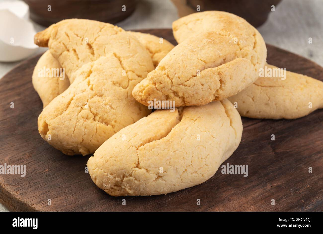 Chipas, typical south american cheese bun over wooden table with ...