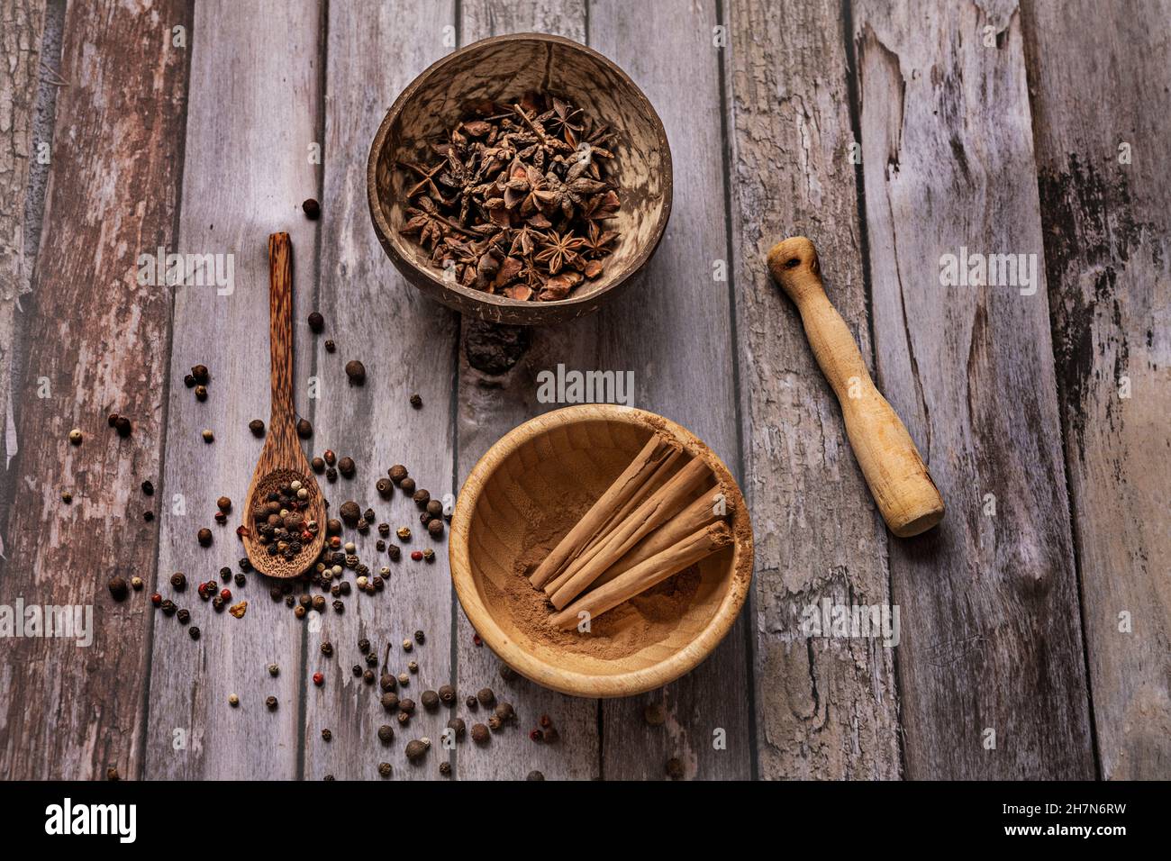 Sweet and savory ingredients ready to be crushed with a wooden mortar ...