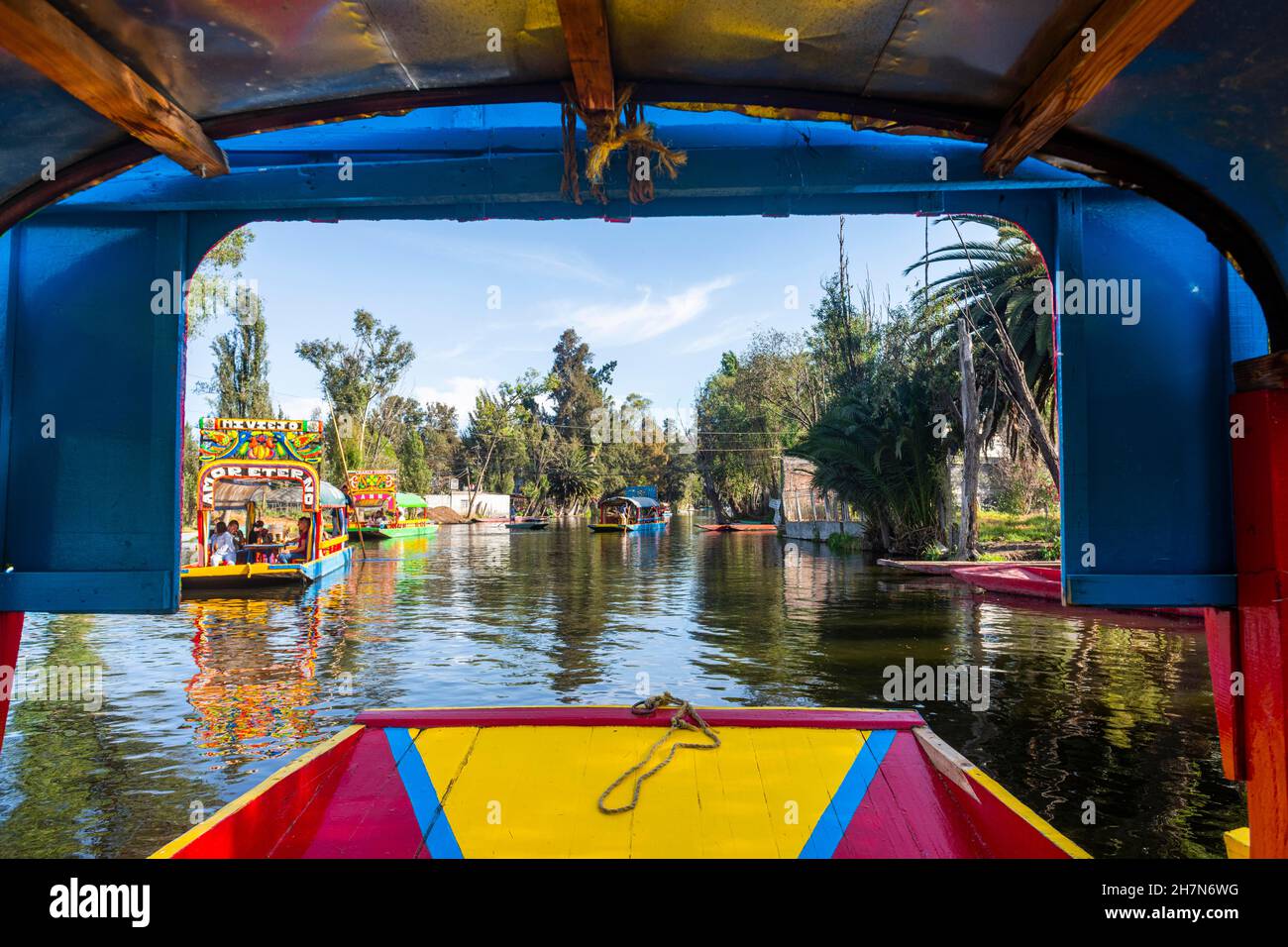 Colourful boats on the aztec canal system, Unesco site Xochimilco ...