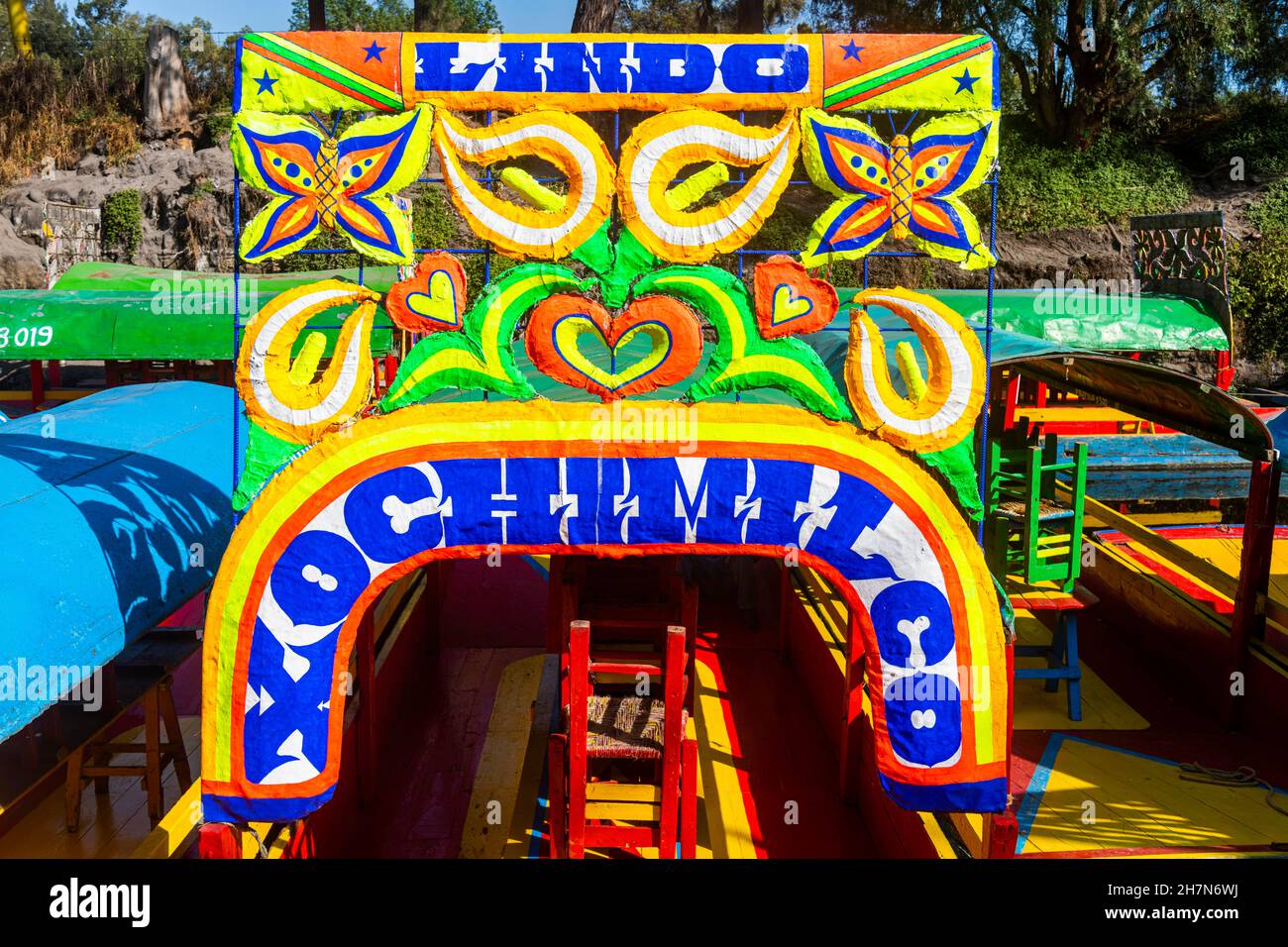 Colourful boats on the aztec canal system, Unesco site Xochimilco ...