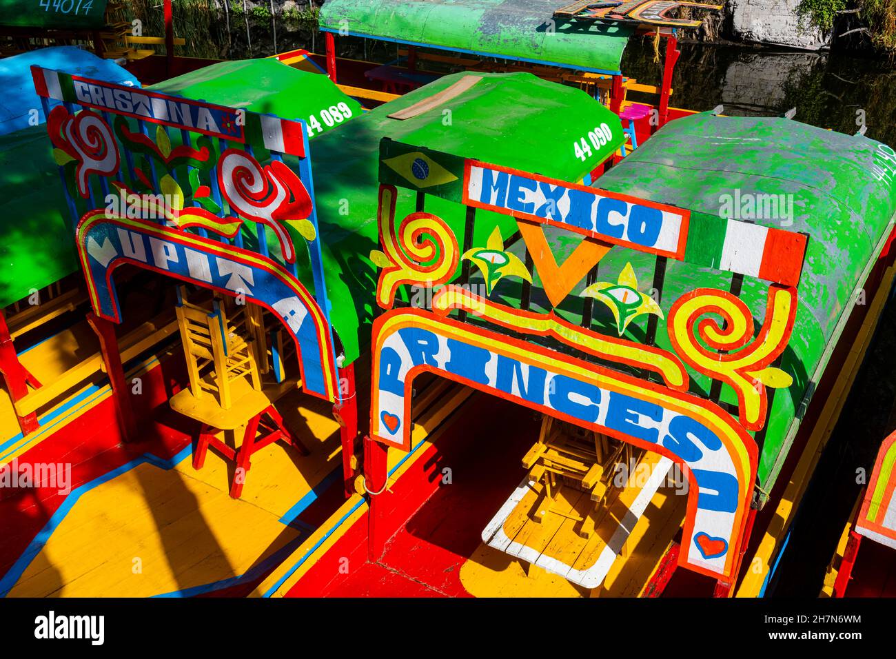 Colourful boats on the aztec canal system, Unesco site Xochimilco ...