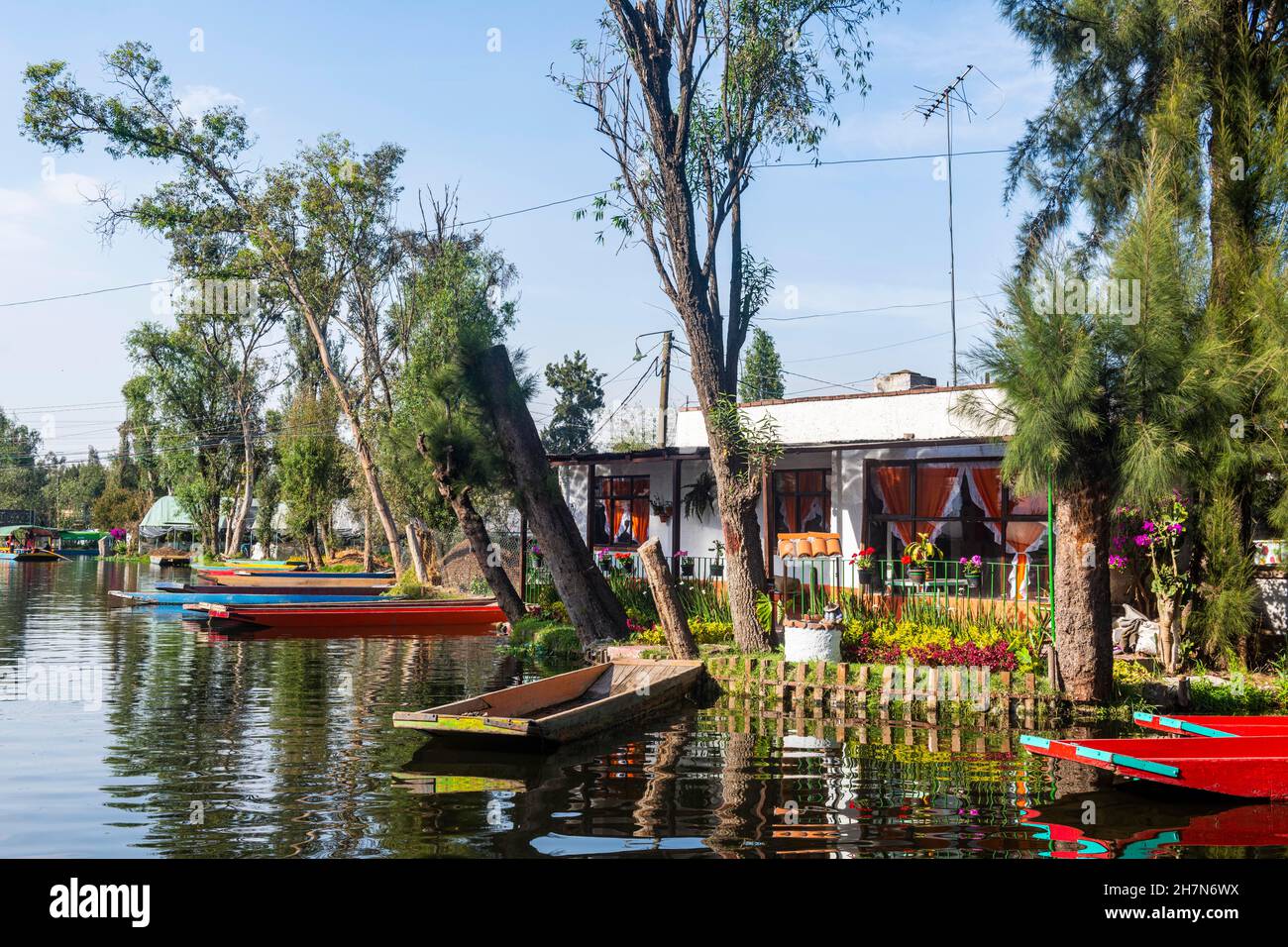 Colourful boats on the aztec canal system, Unesco site Xochimilco ...
