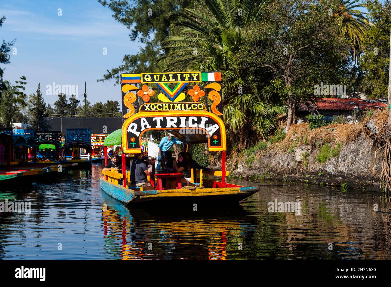 Colourful boats on the aztec canal system, Unesco site Xochimilco ...