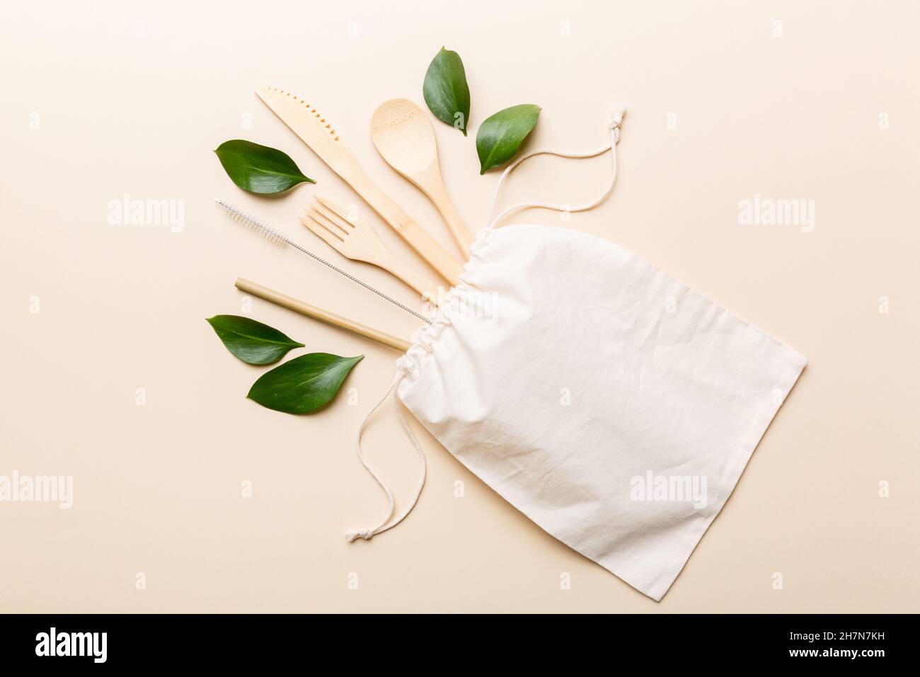 Eco friendly reusable recyclable white eco bag with kitchenware on ...