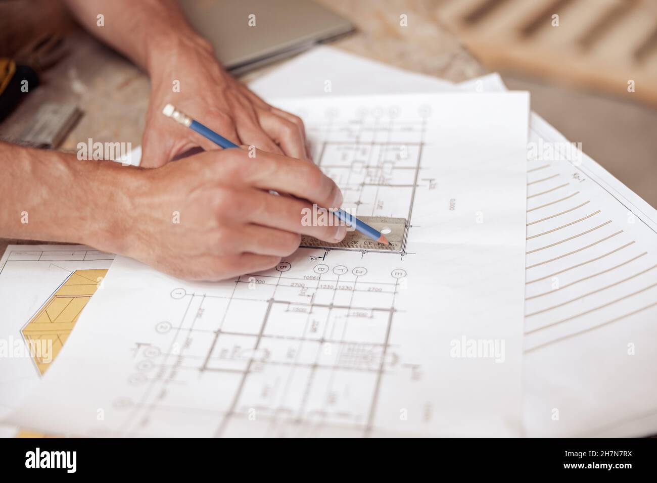Male architect hands drawing architectural building plan Stock Photo ...