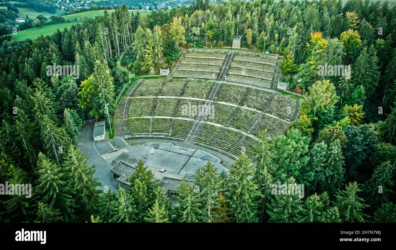 Scenic view of an old amphitheatre surrounded by trees in a forest ...